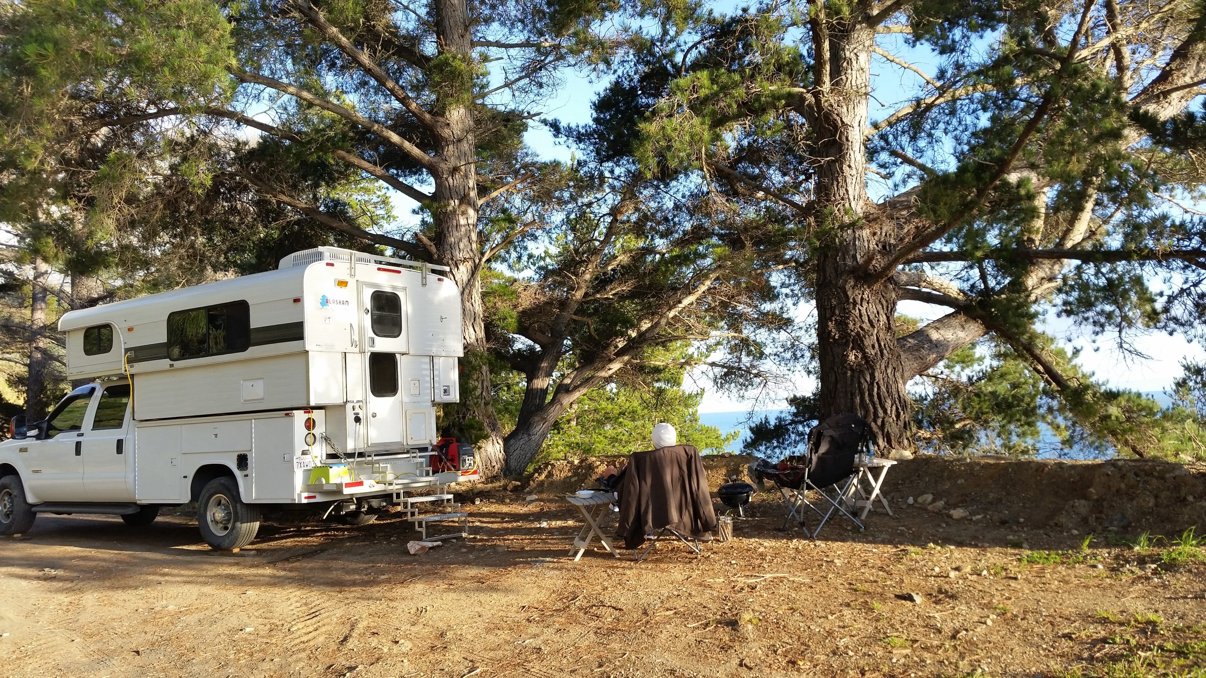 Service Truck Cabover Camper Explores the Outdoors