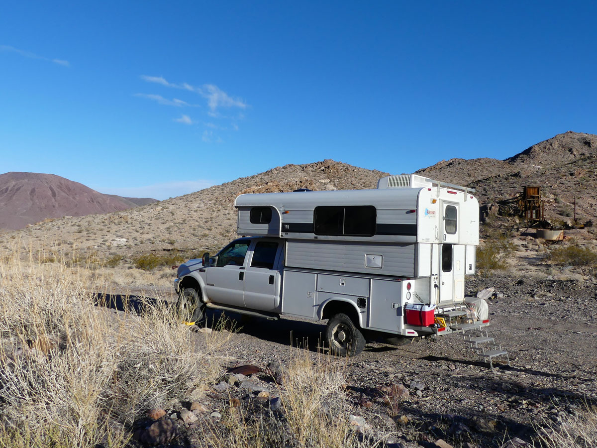 Service Truck Cabover Camper Explores the Outdoors