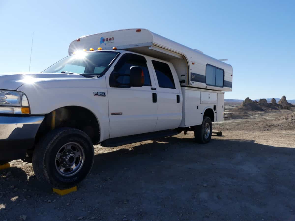 Service Truck Cabover Camper Explores the Outdoors