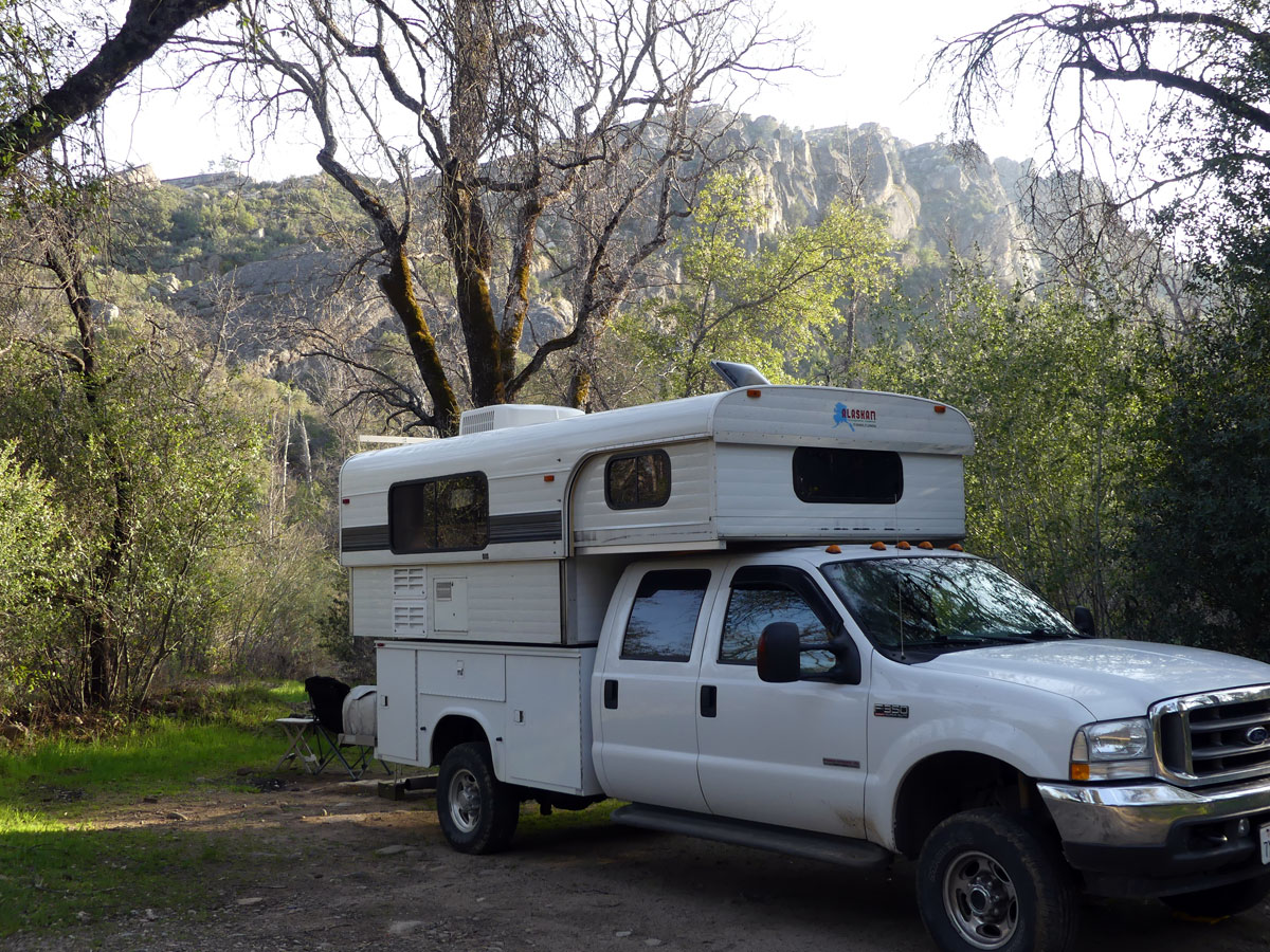 Service Truck Cabover Camper Explores the Outdoors