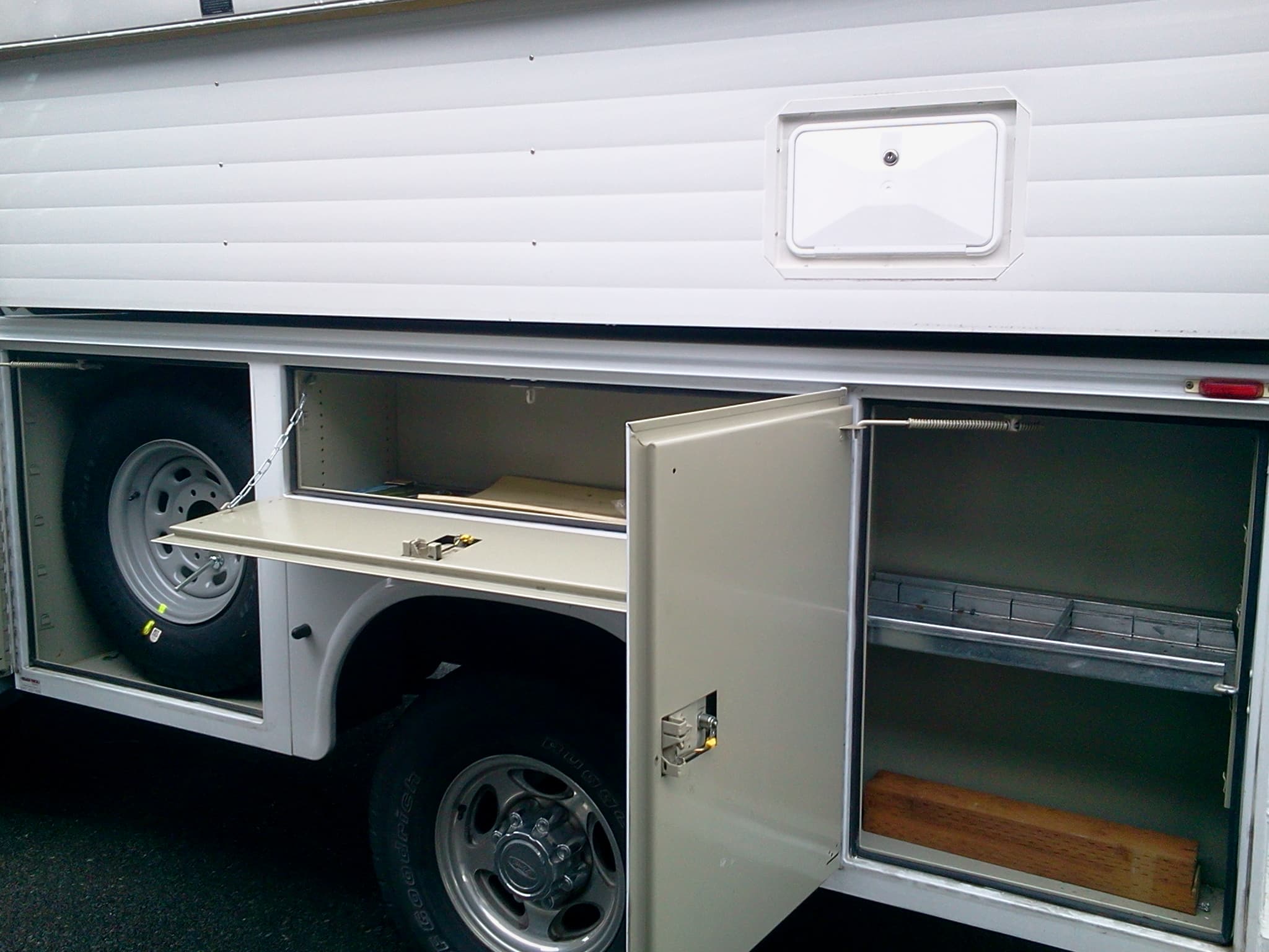 Service Truck Cabover Camper Explores the Outdoors